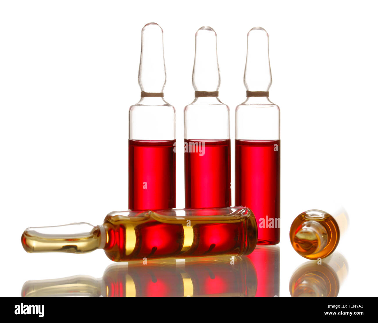 medical ampules with bright liquid, isolated on white Stock Photo - Alamy
