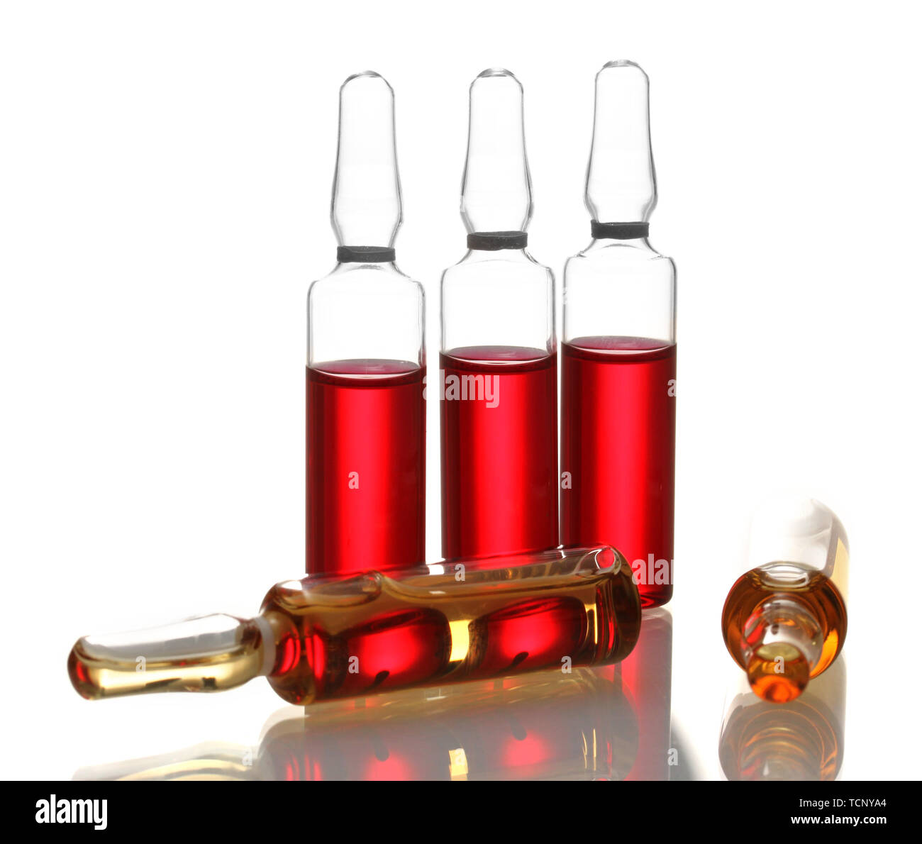 medical ampules with bright liquid, isolated on white Stock Photo - Alamy
