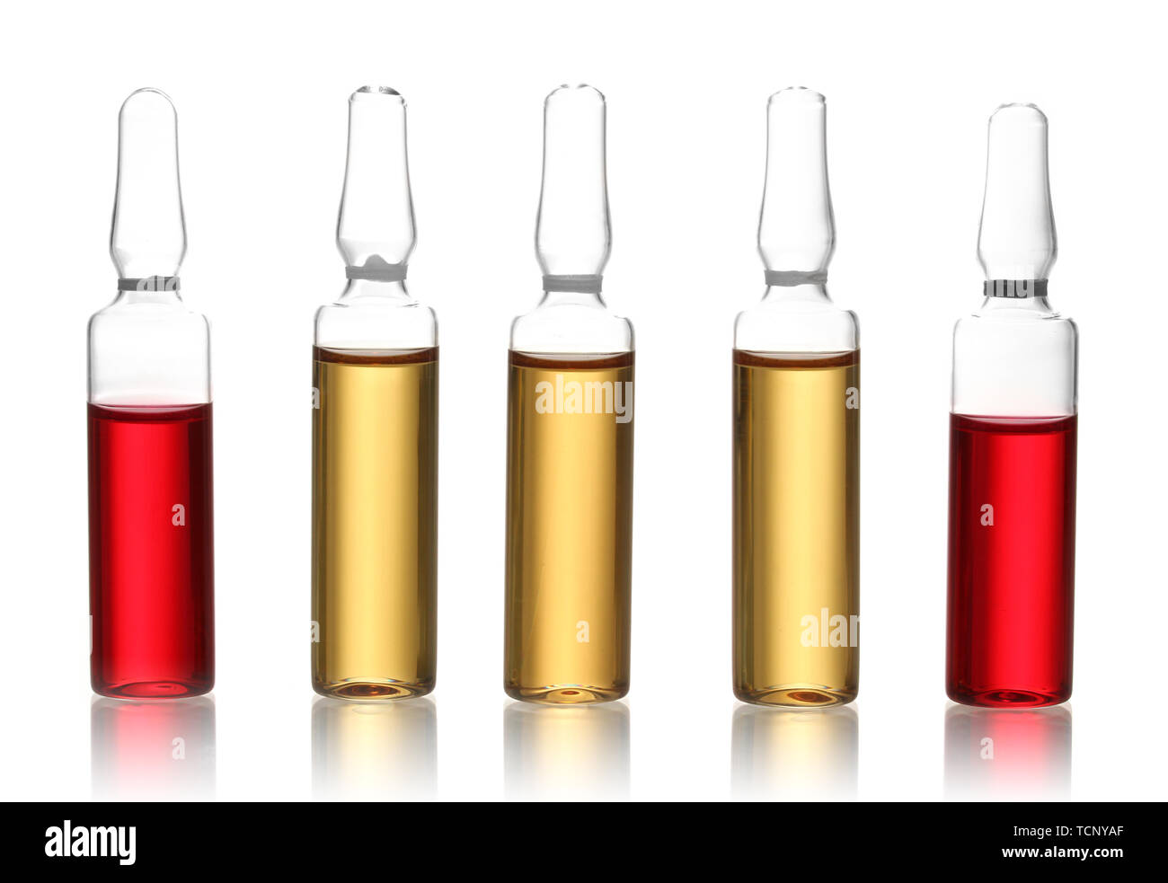 medical ampules with bright liquid, isolated on white Stock Photo - Alamy
