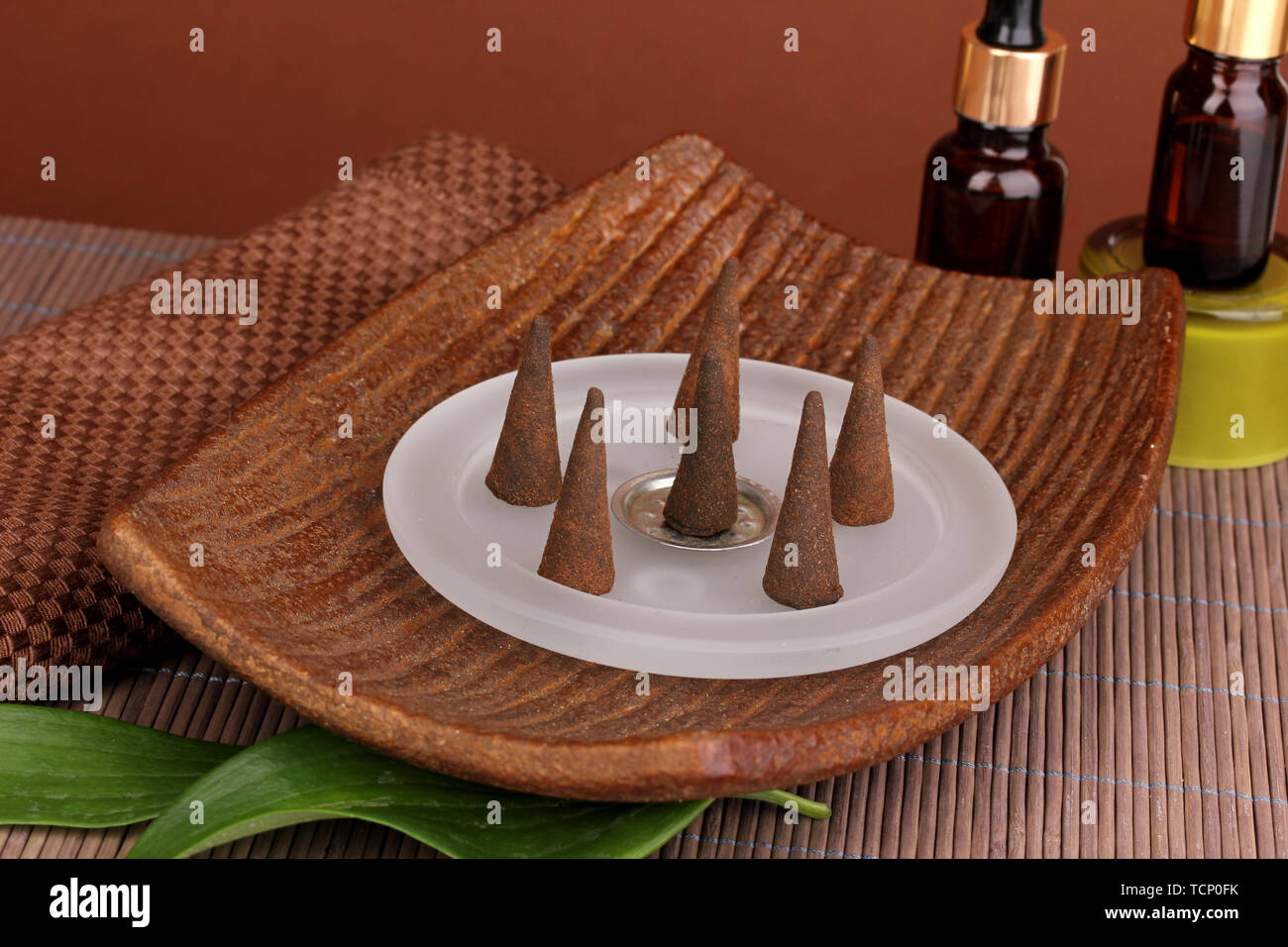 aromatherapy setting on brown background Stock Photo - Alamy
