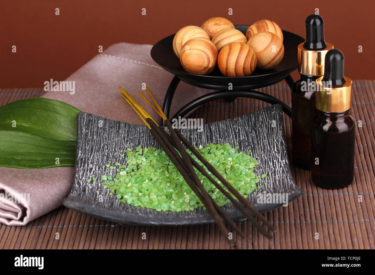 aromatherapy setting on brown background Stock Photo - Alamy