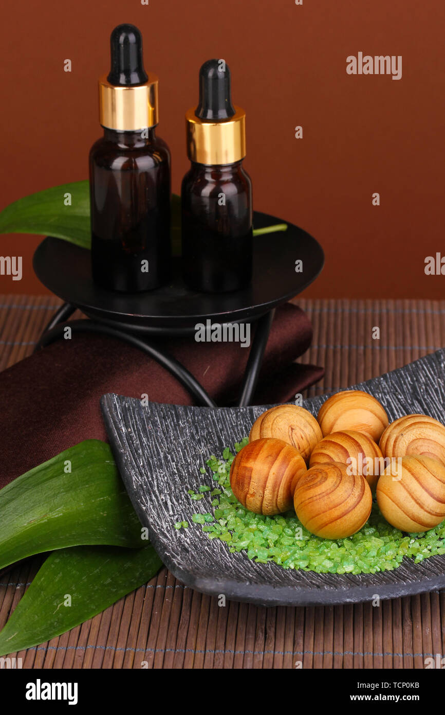 aromatherapy setting on brown background Stock Photo - Alamy