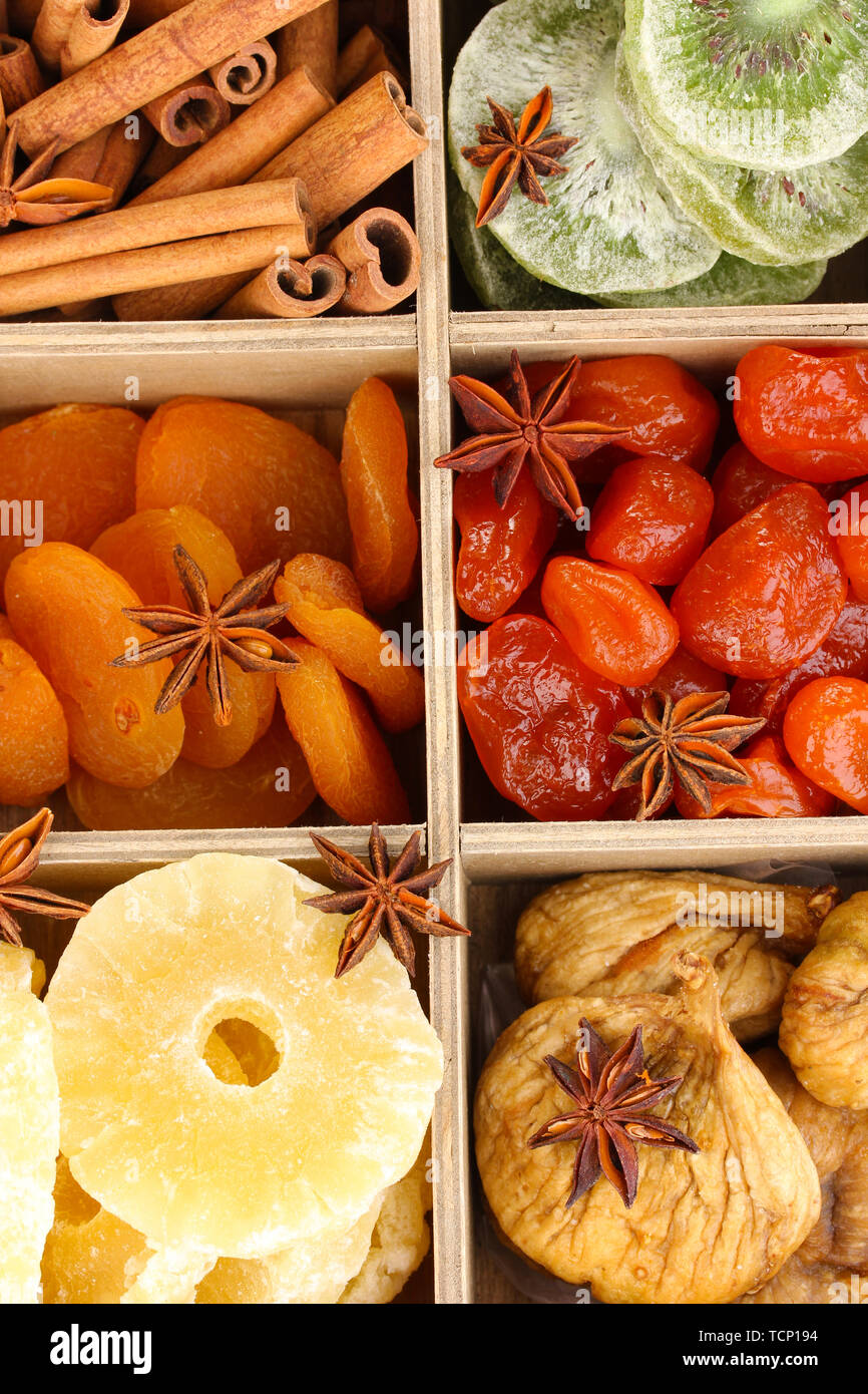 Dried fruits and cinnamon with anise stars in box close-up Stock Photo ...
