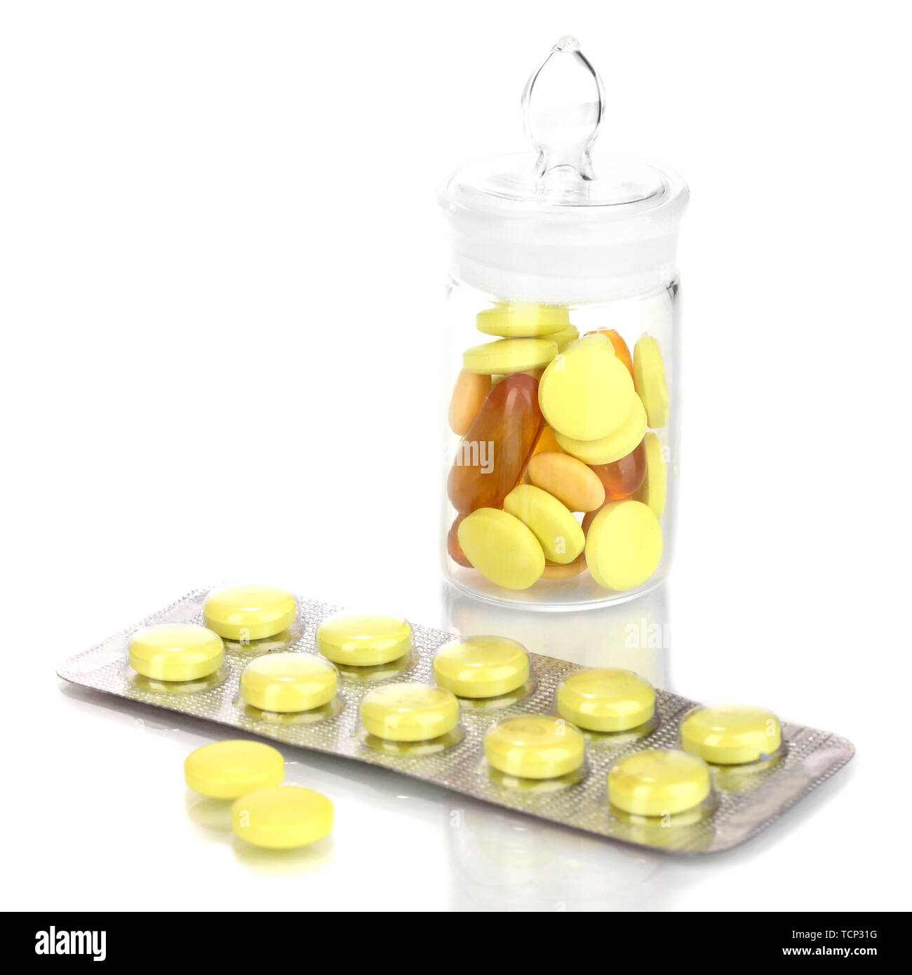 Pills packed in blister and receptacle isolated on white Stock Photo ...