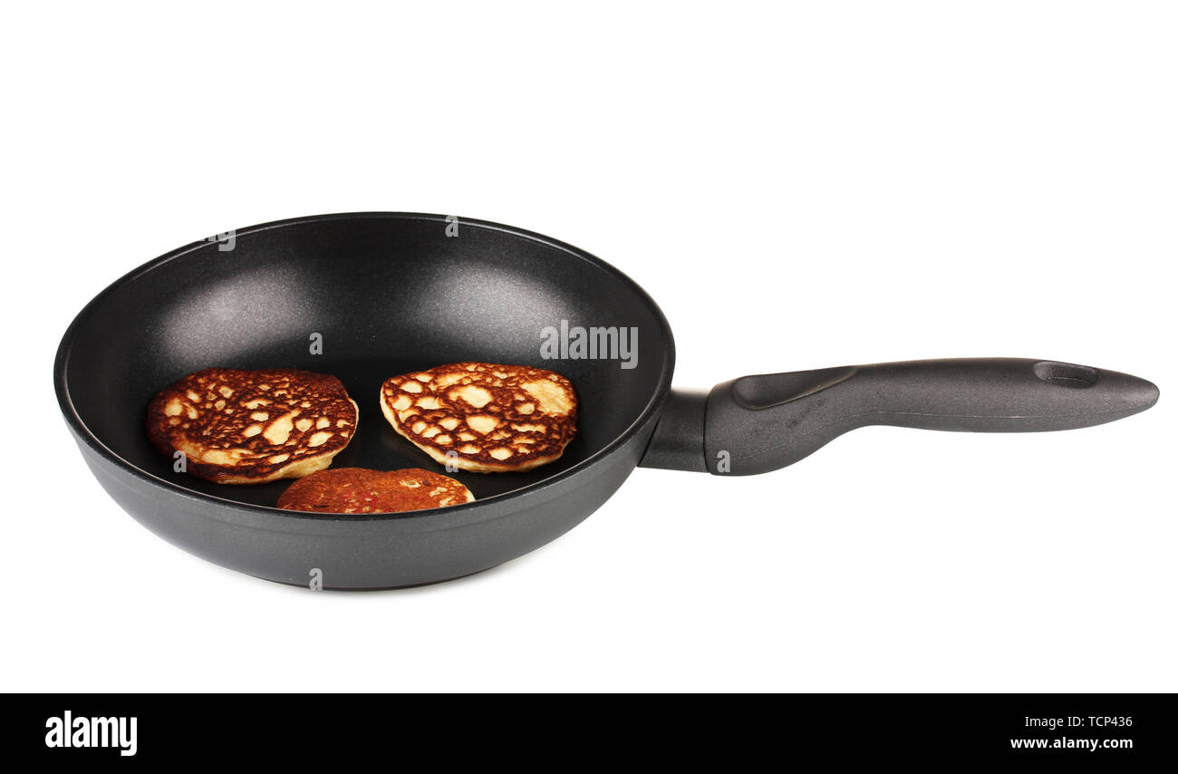delicious sweet pancakes in frying pan isolated on white Stock Photo ...