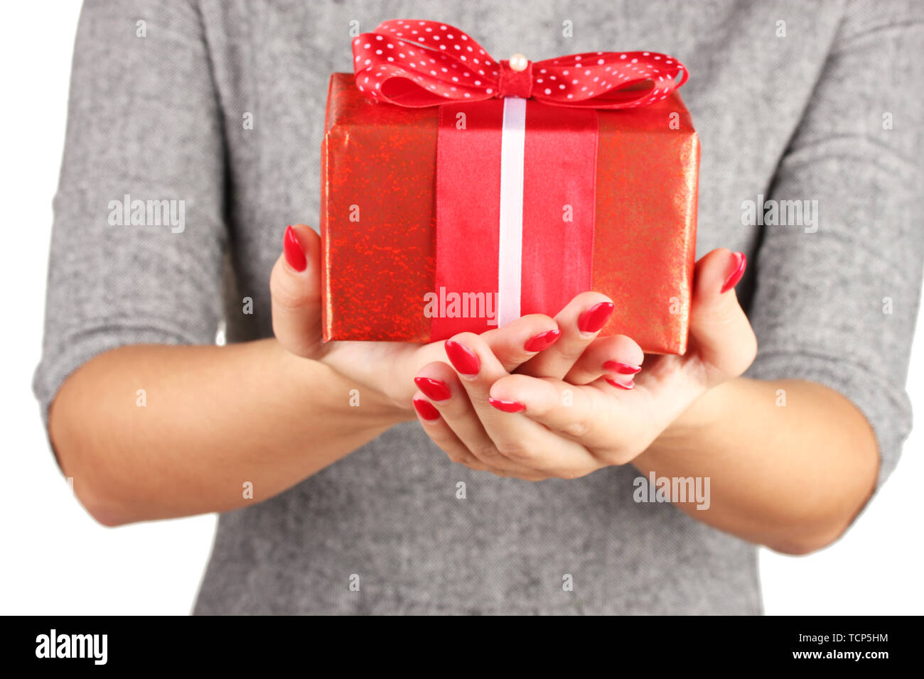 woman holds box with gift on white background close-up Stock Photo - Alamy