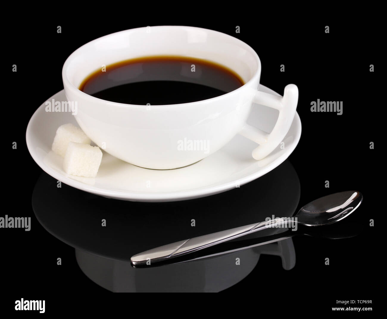 A cup of strong coffee isolated on black Stock Photo - Alamy