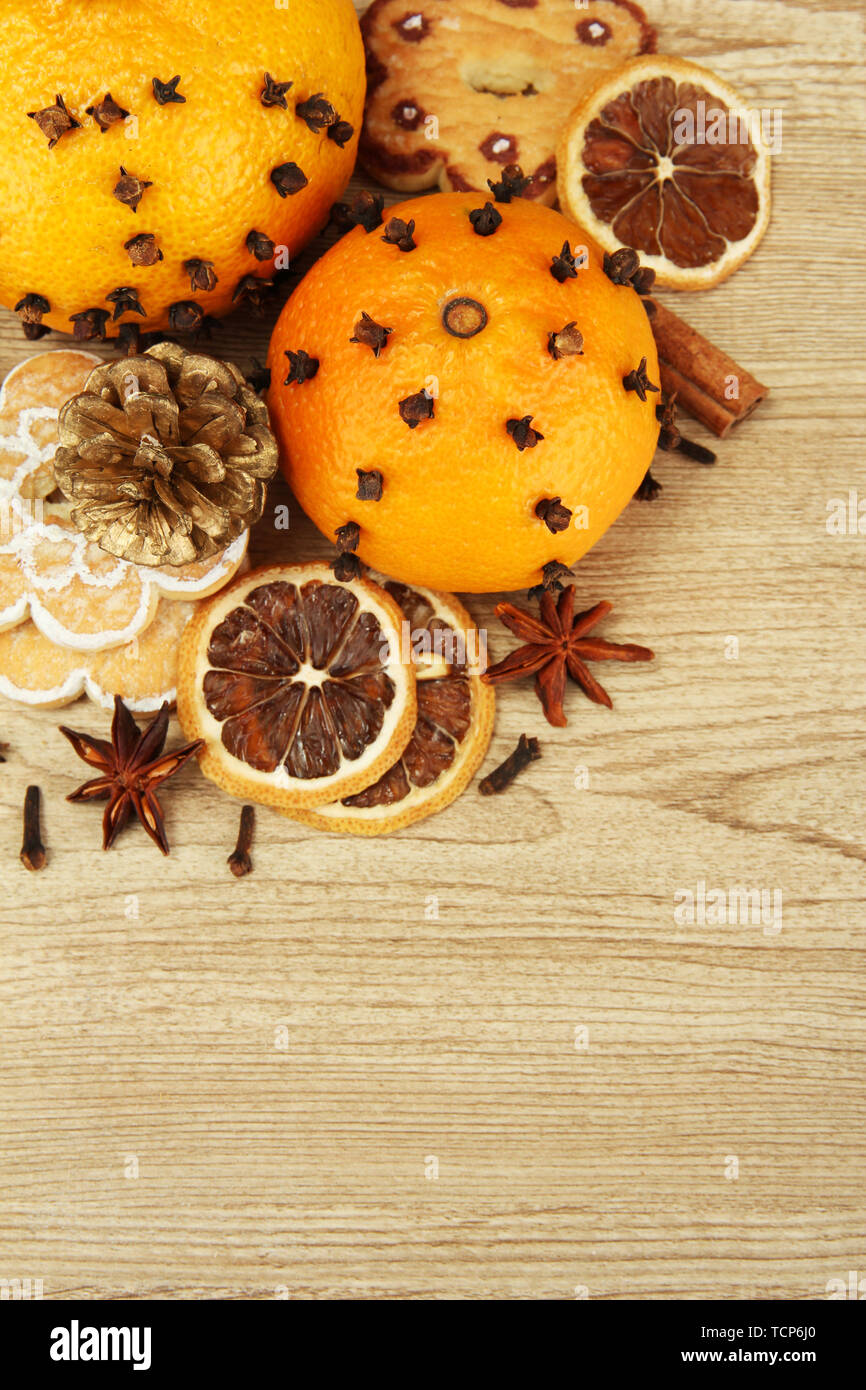 composition of christmas spices and tangarines, on wooden background ...