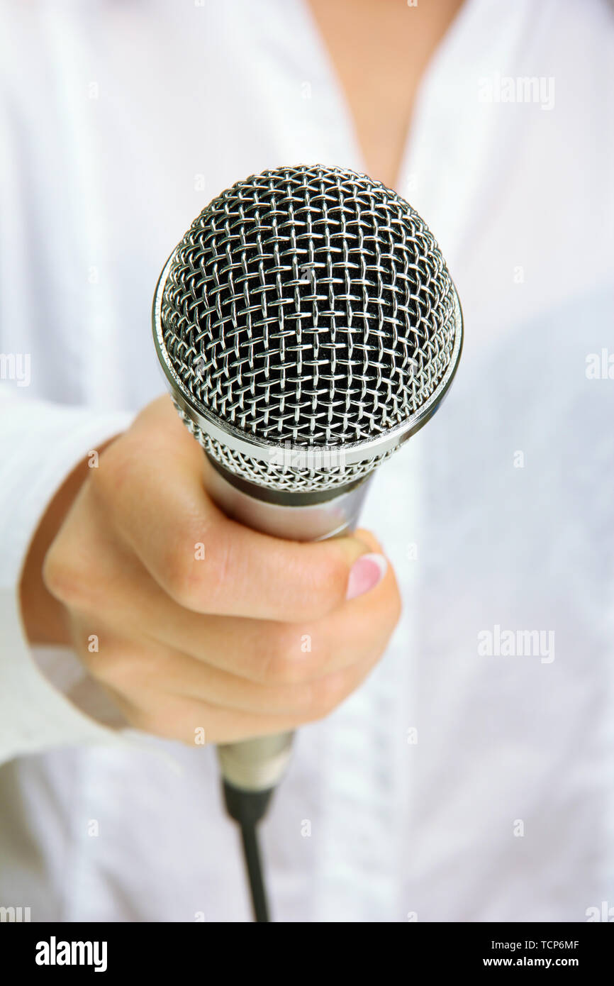female with microphone, close up Stock Photo - Alamy