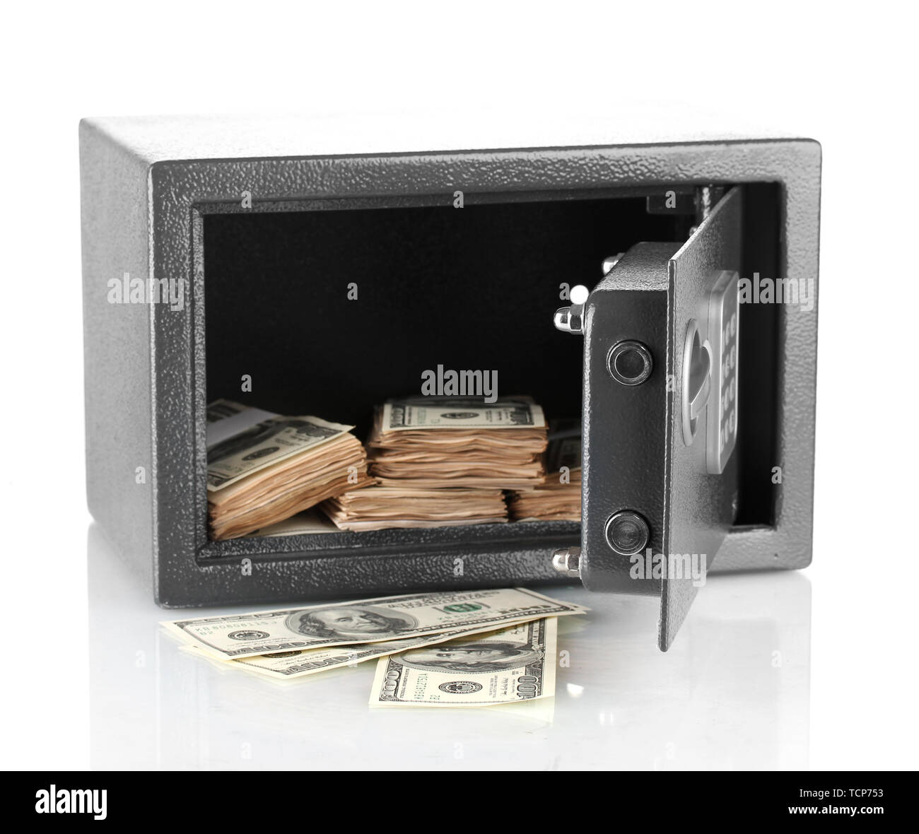Money in open safe isolated on white Stock Photo - Alamy