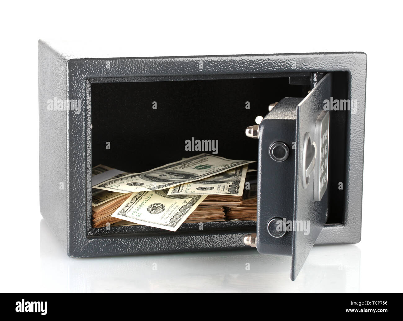 Money in open safe isolated on white Stock Photo - Alamy