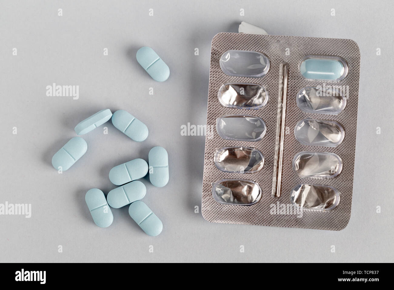 Open and used pack of blue pills Stock Photo - Alamy
