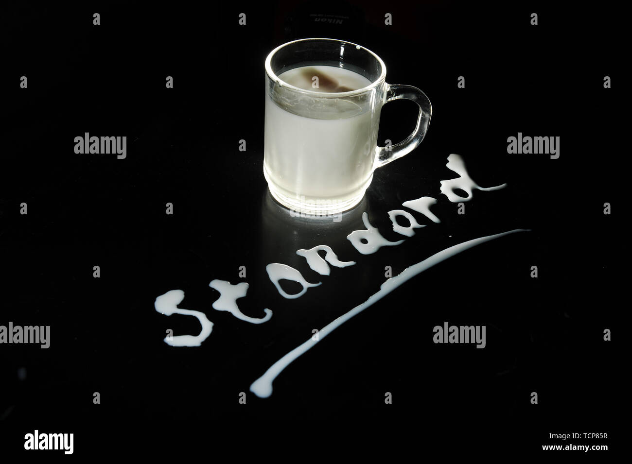 Milk testing cup hi-res stock photography and images - Alamy