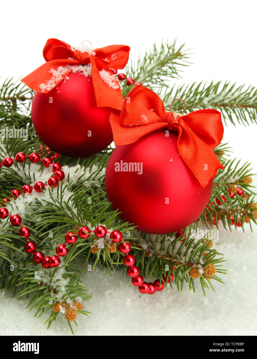 Christmas balls on fir tree with snow, isolated on white Stock Photo ...