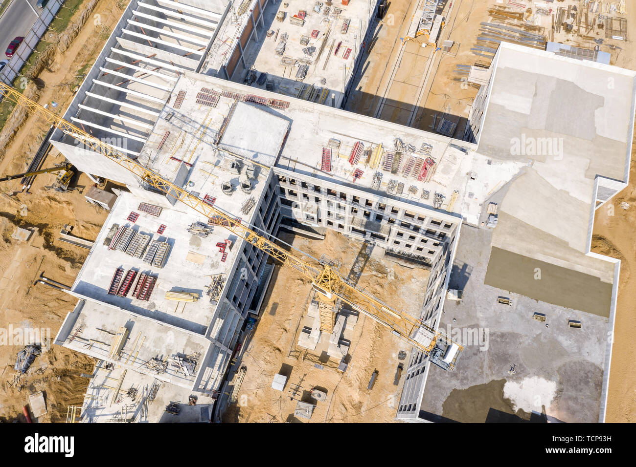 aerial top view of city construction site. modern public building under ...