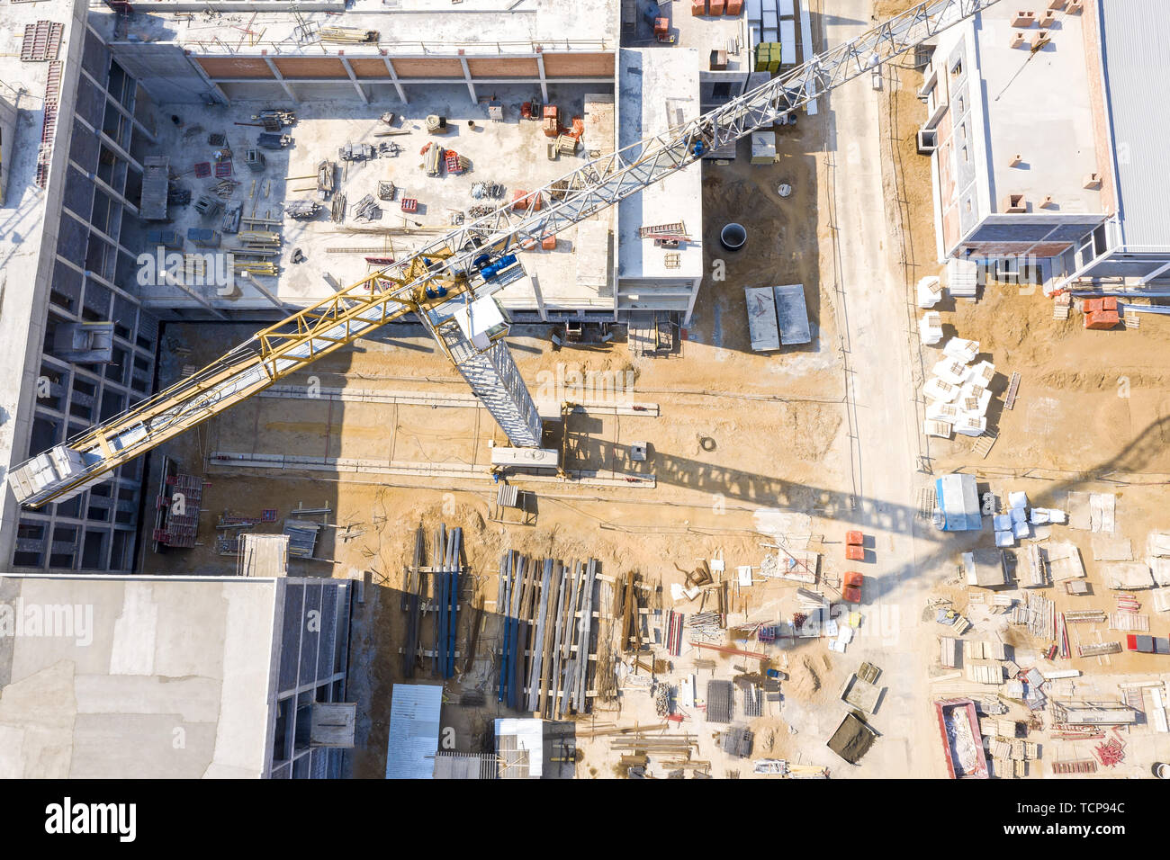 aerial view of city construction site. new building under construction ...