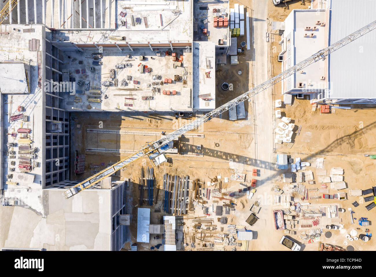 construction of new public building. aerial top view of city ...