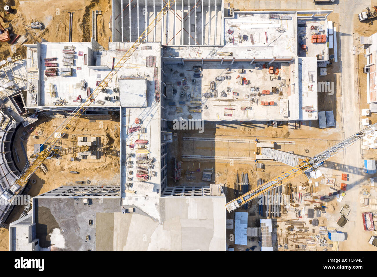 construction of new public building. aerial top view of city ...