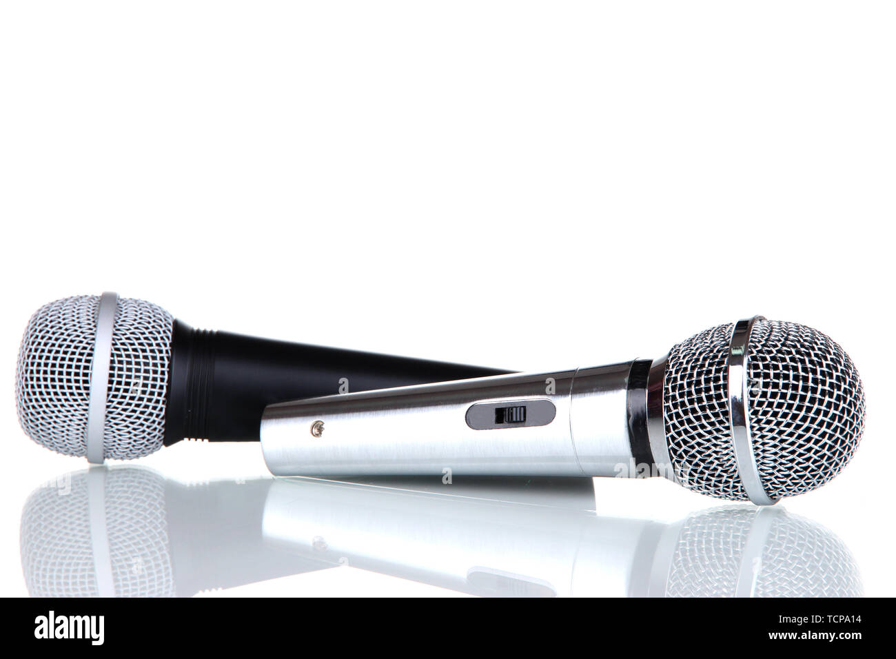 Silver and black microphones isolated on white Stock Photo - Alamy