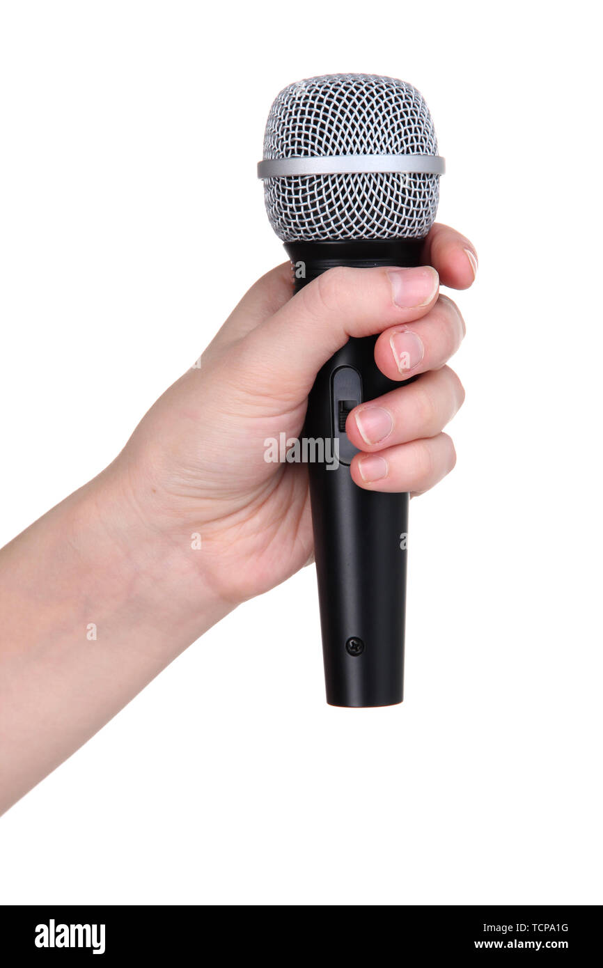 Black microphone in hand isolated on white Stock Photo - Alamy
