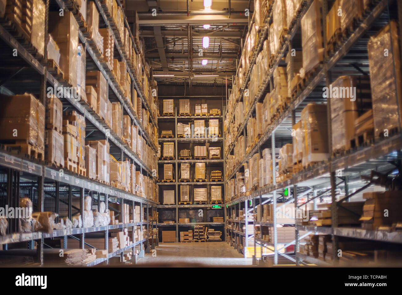 Goods on indoor shelves Stock Photo - Alamy