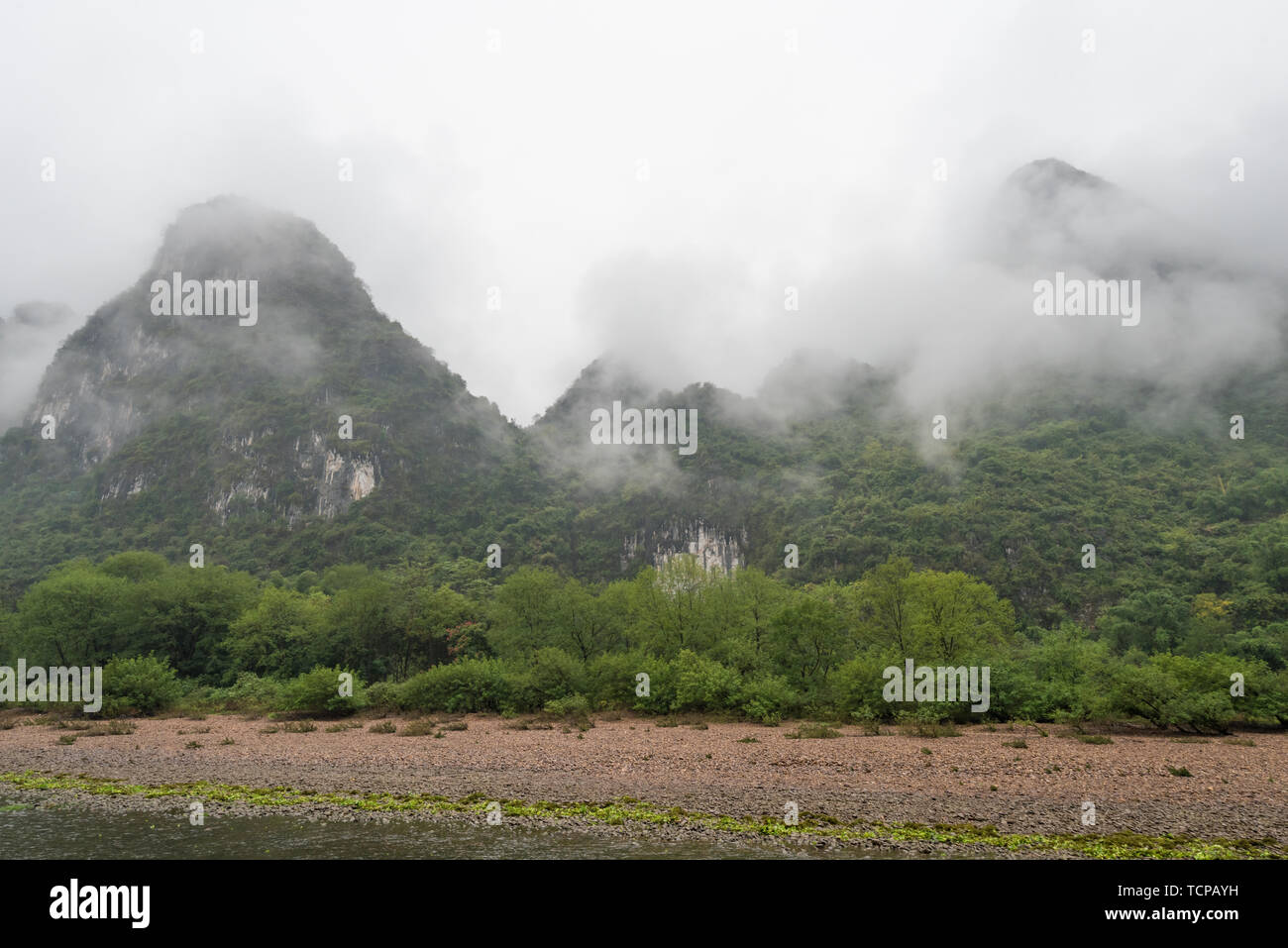 Landscape of the Li River in Guilin, China in the smoke and rain Stock ...