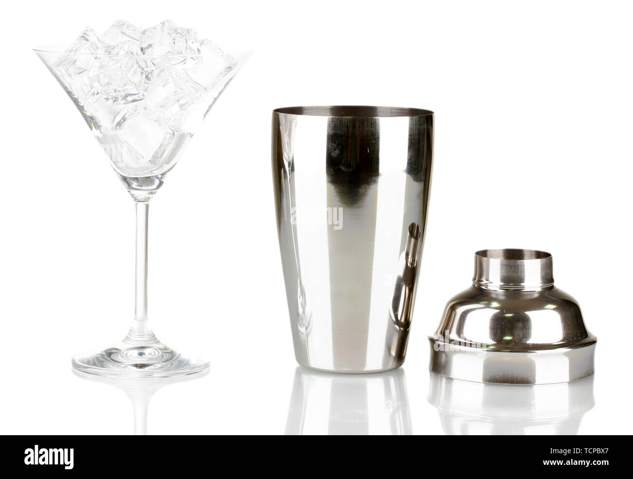 Cocktail shaker and cocktail glass isolated on white Stock Photo - Alamy