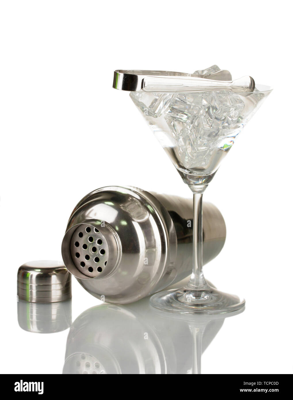 Cocktail shaker and cocktail glass isolated on white Stock Photo - Alamy