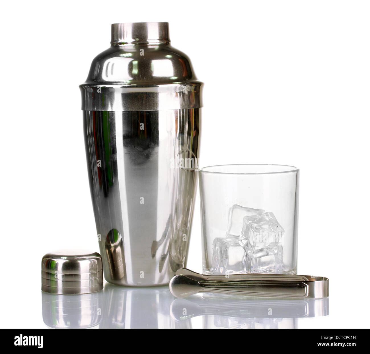 Cocktail shaker and cocktail glass isolated on white Stock Photo - Alamy