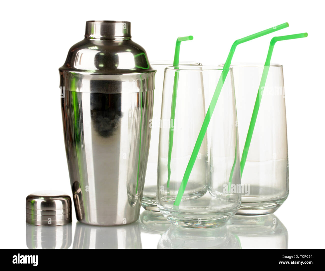 Cocktail shaker and glasses isolated on white Stock Photo - Alamy