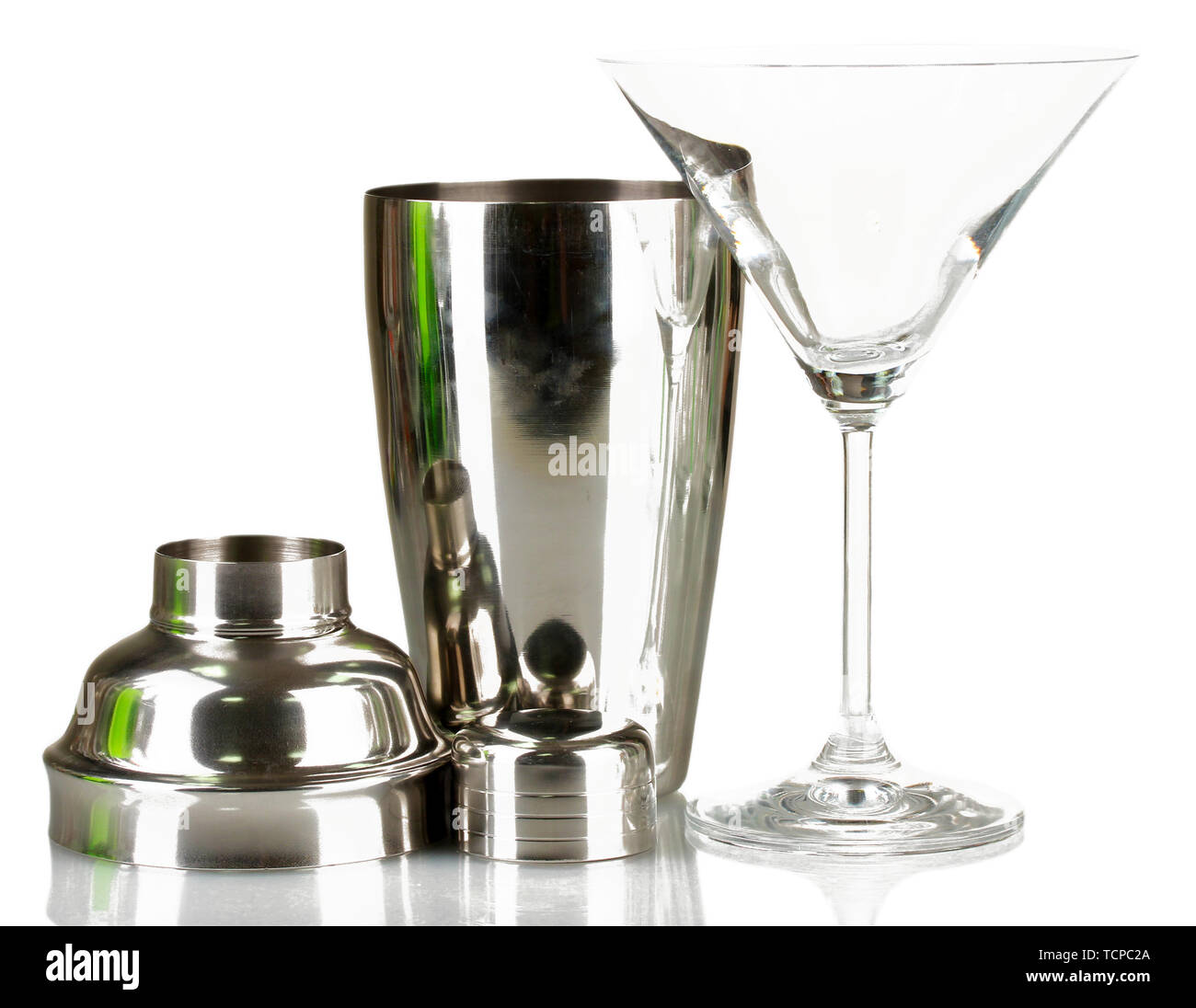 Cocktail shaker and cocktail glass isolated on white Stock Photo - Alamy