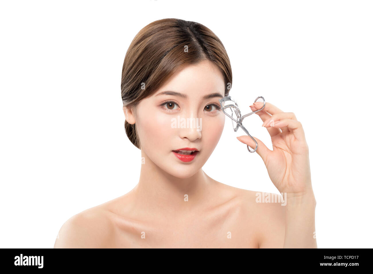 Beauty in makeup in shed shot against white background Stock Photo - Alamy
