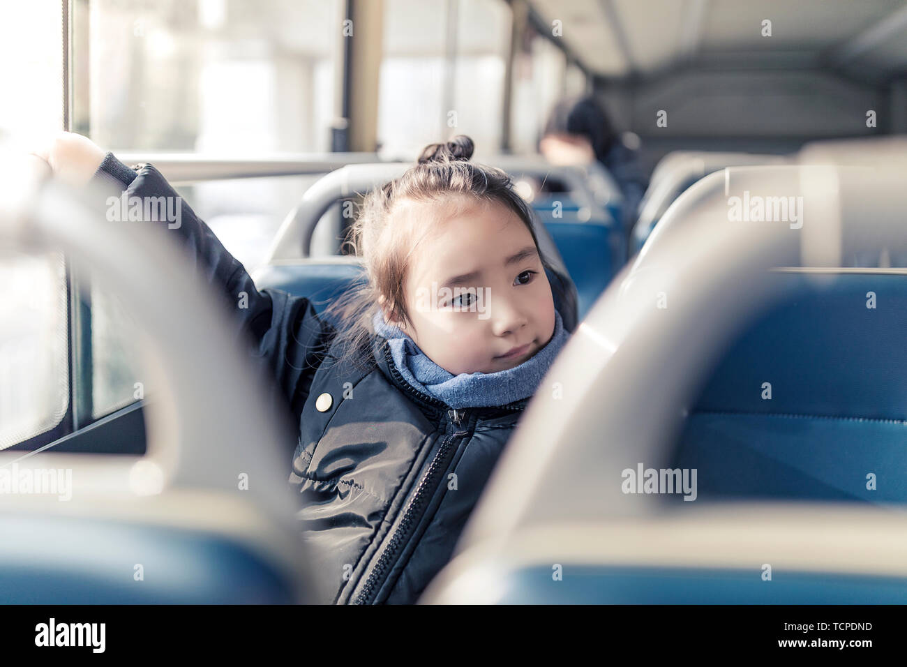 Adorable little Asian girl on the bus Stock Photo - Alamy