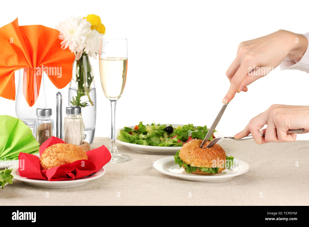 Female hand with dinner isolated on white Stock Photo - Alamy