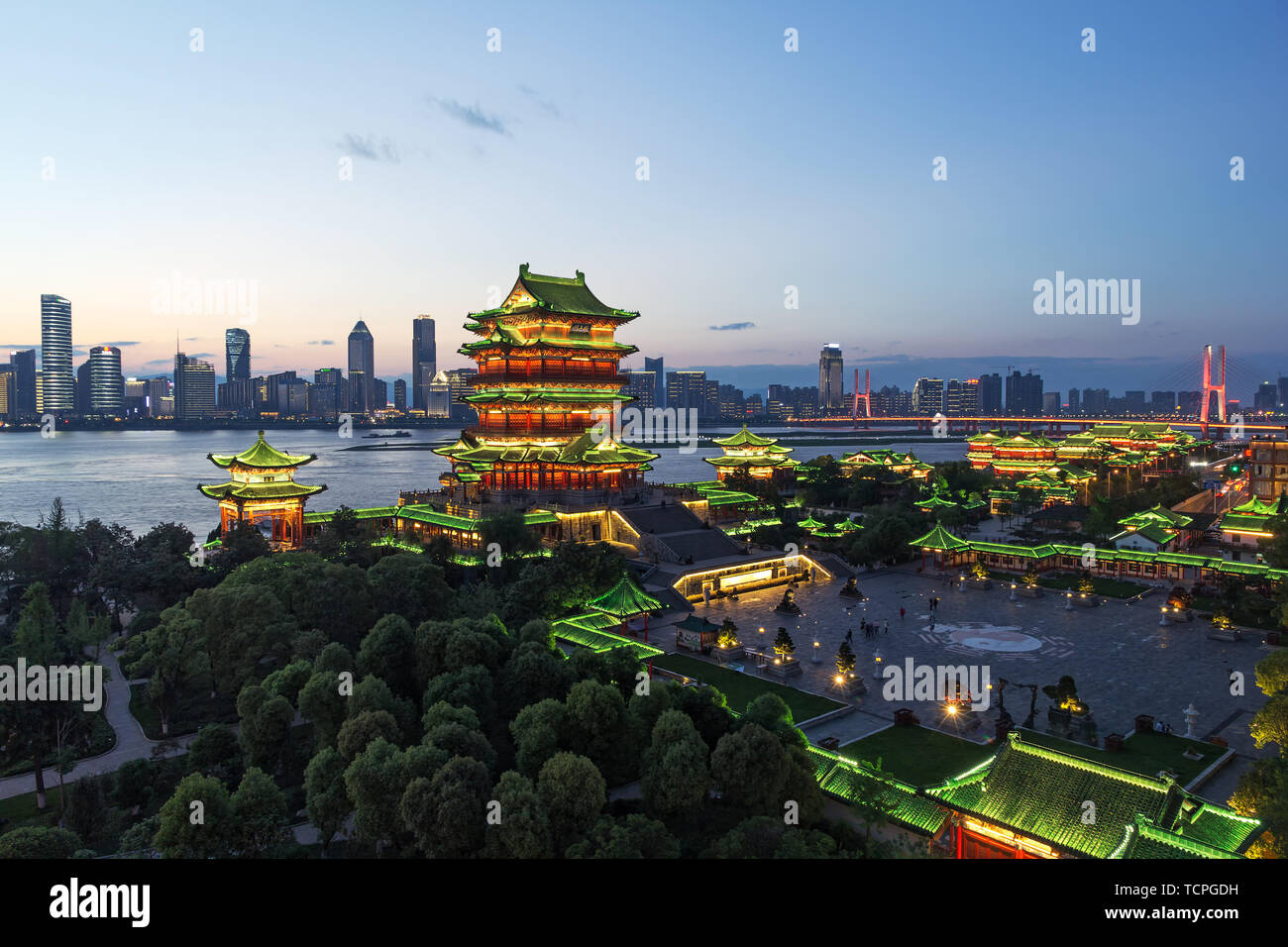 Illuminated urban skyscrapers in the evening business teng wang ...