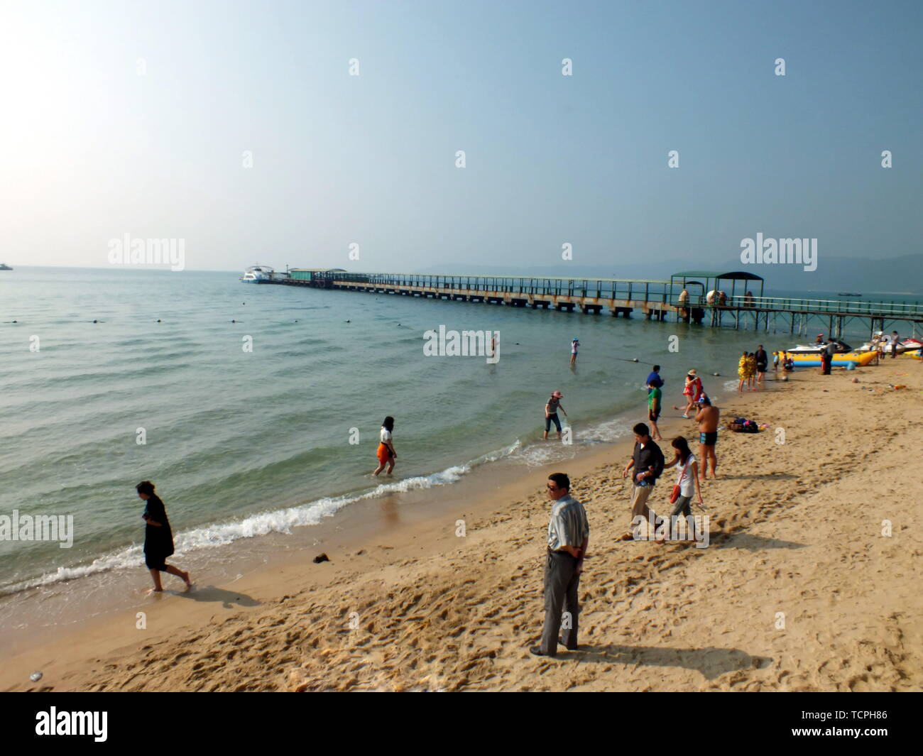 Hainan island beach surfing hi-res stock photography and images - Alamy