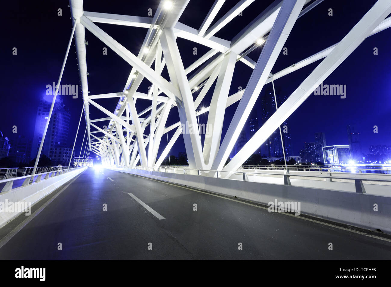 modern bridge with empty road floor at night Stock Photo - Alamy