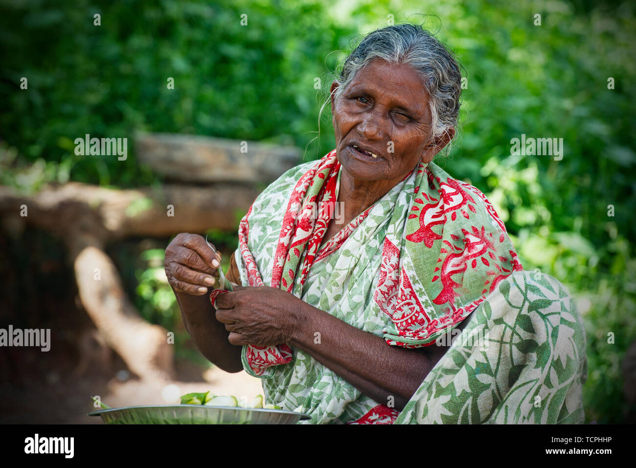 Poverty in Chennai, India, where an old lady with missing teeth and one ...