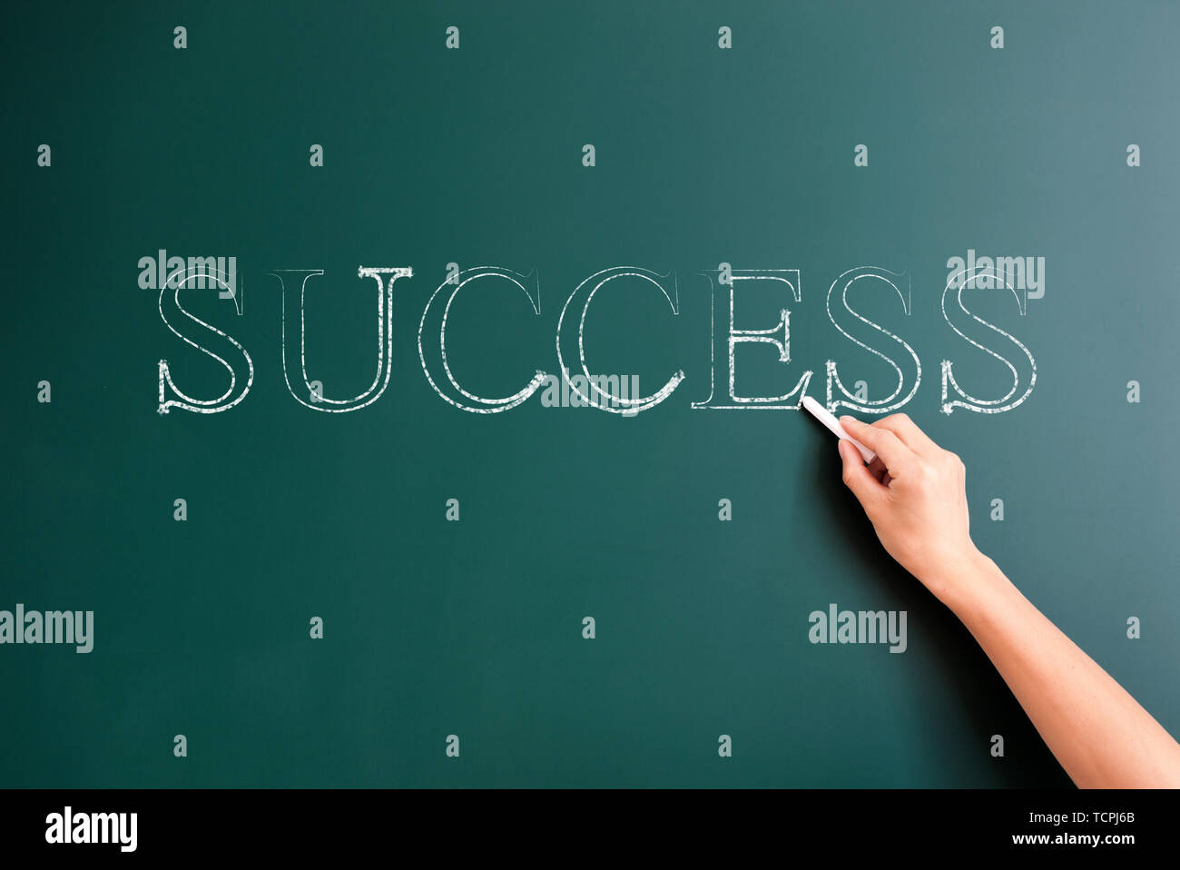 Success written on blackboard Stock Photo - Alamy