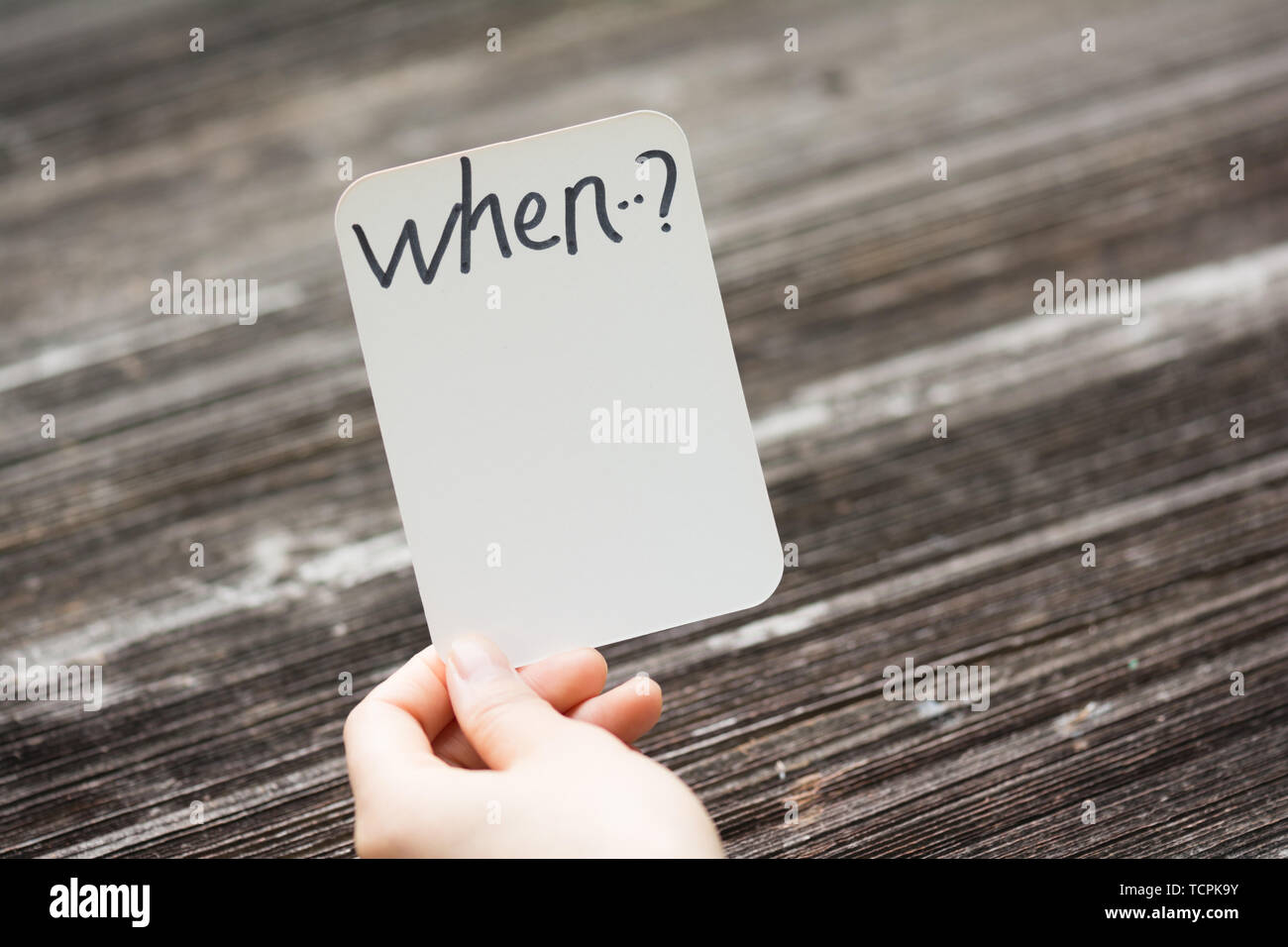 Reynolds card with text on old wood plate Stock Photo - Alamy