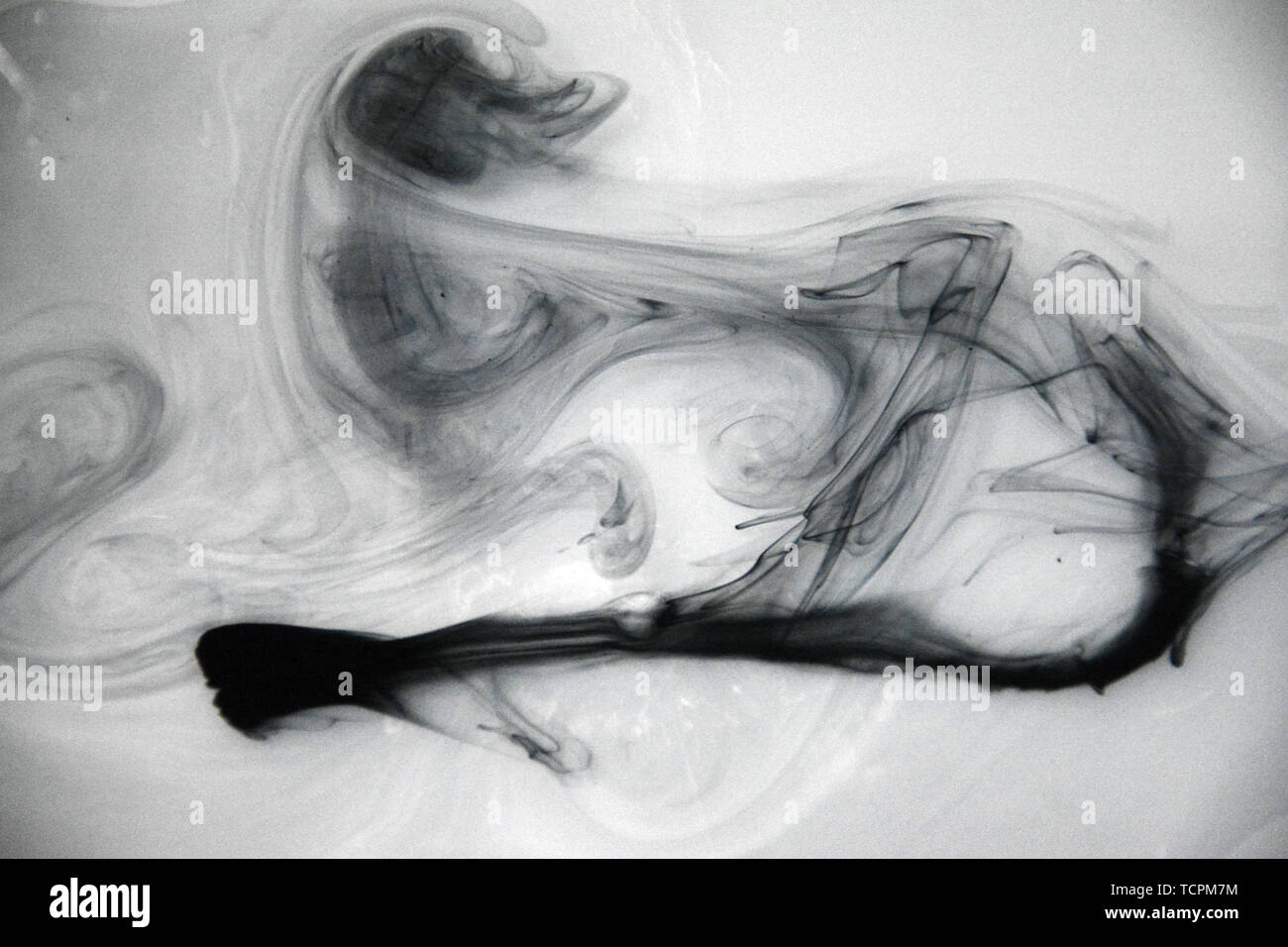 Ink background, ink flowing in water Stock Photo - Alamy