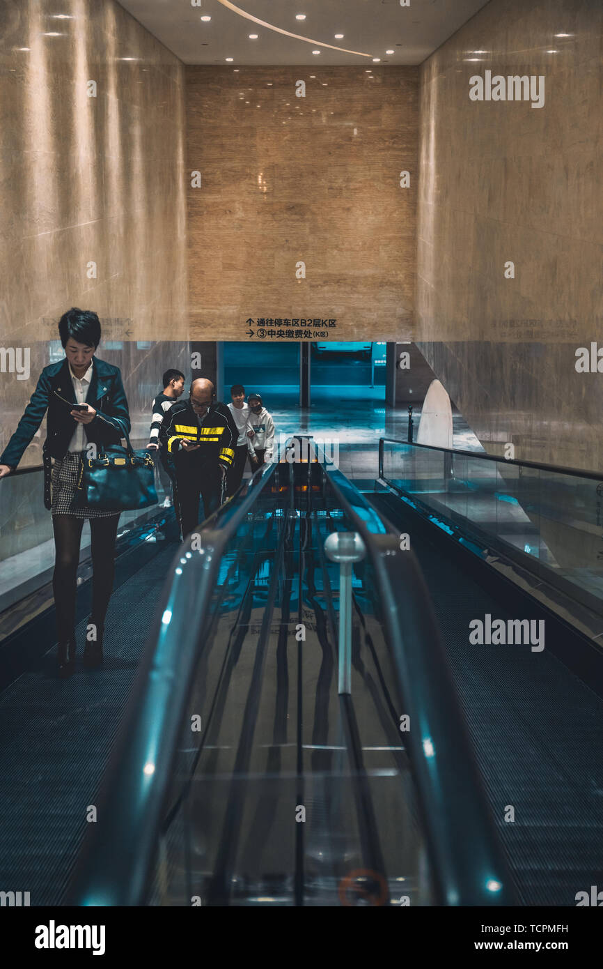 The people who come up from the elevator Stock Photo - Alamy