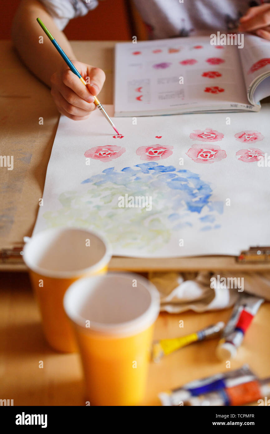 Girl reference textbook with fine watercolor brush to practice drawing ...