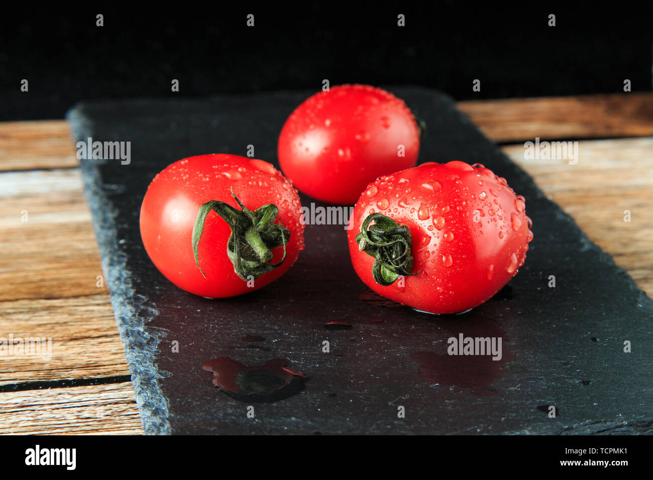 Fresh, delicious little tomatoes Stock Photo - Alamy