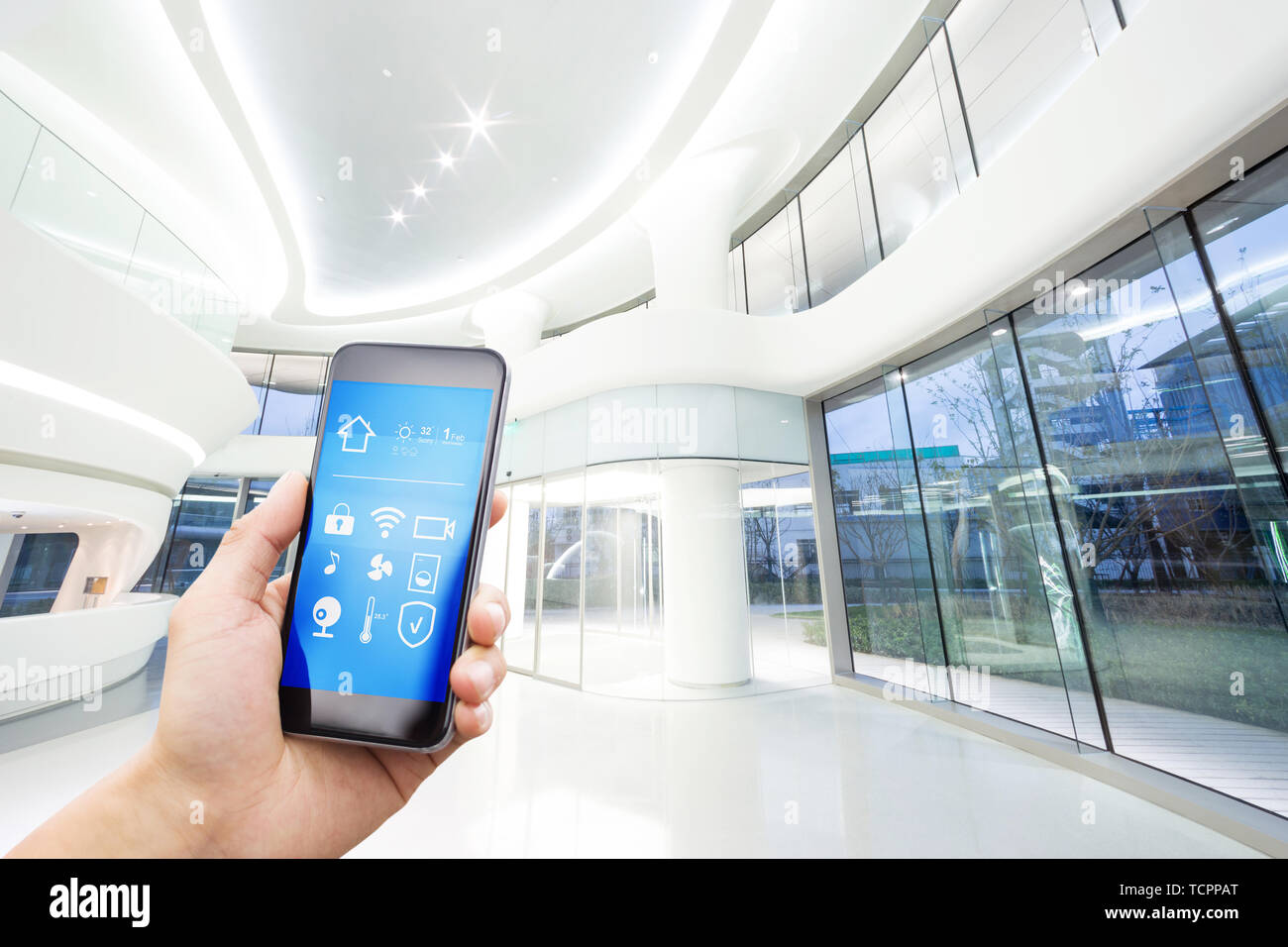 smart phone with smart home with modern hall Stock Photo - Alamy