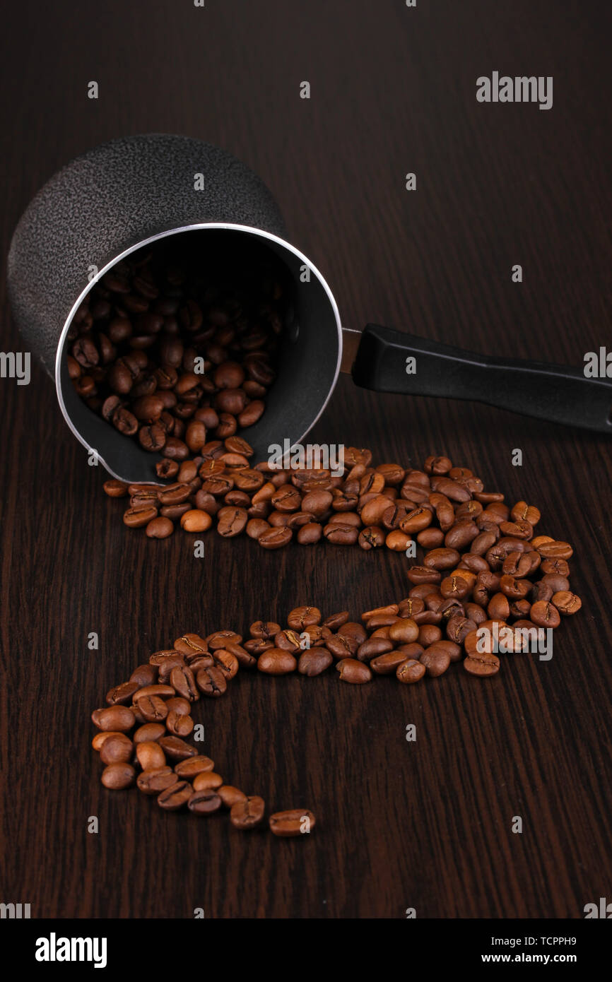 Coffee maker on brown table Stock Photo - Alamy