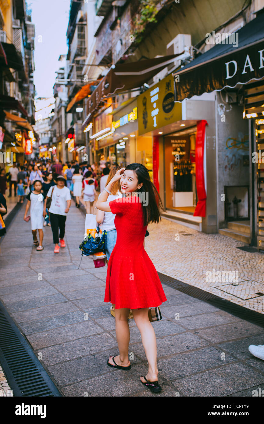 Red dress to Macau Stock Photo - Alamy