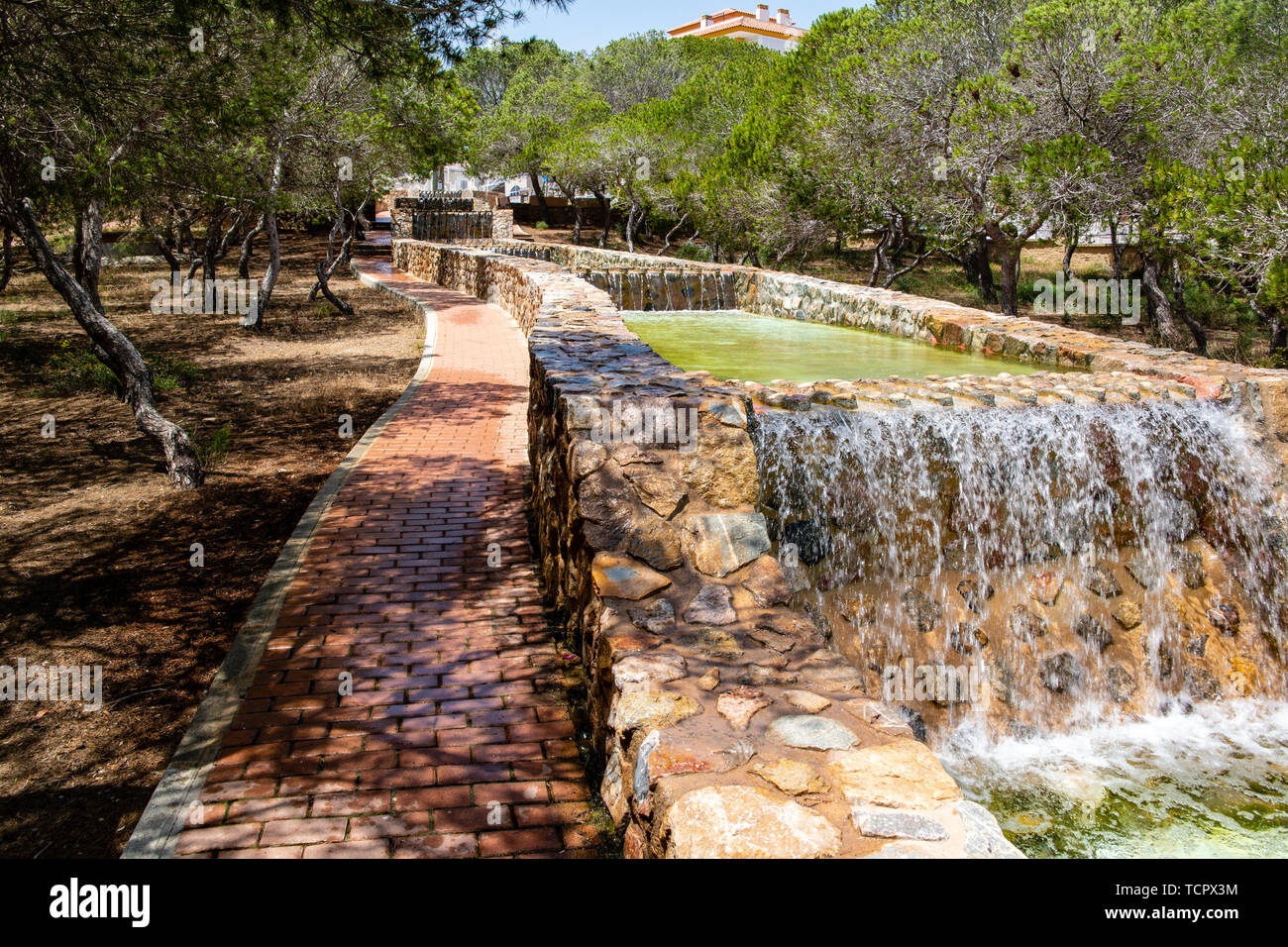 Water feature in Park in Spain with several small waterfalls and pools ...