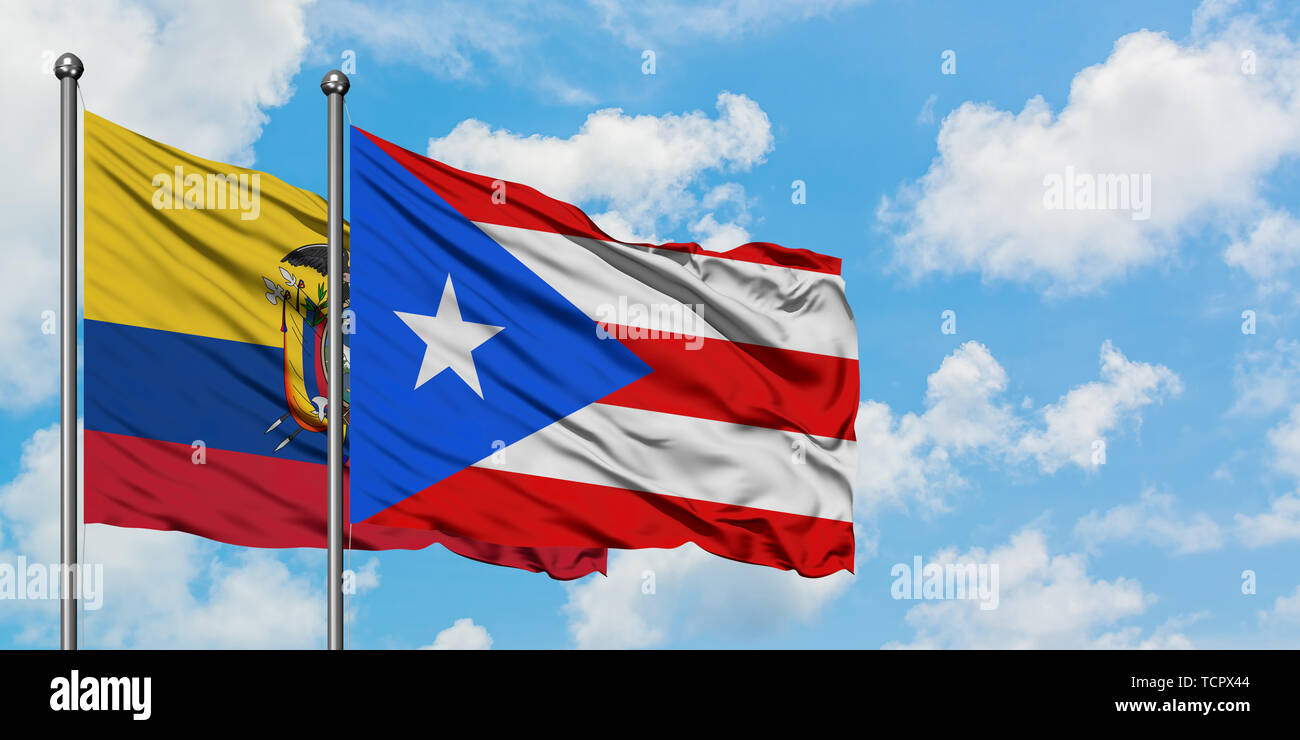 Ecuador and Puerto Rico flag waving in the wind against white cloudy ...