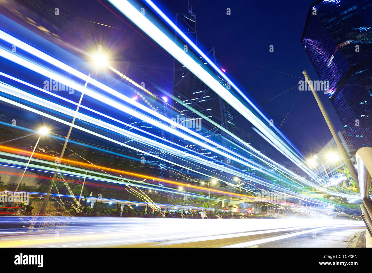 traffic light trails at modern city street,hongkong Stock Photo - Alamy